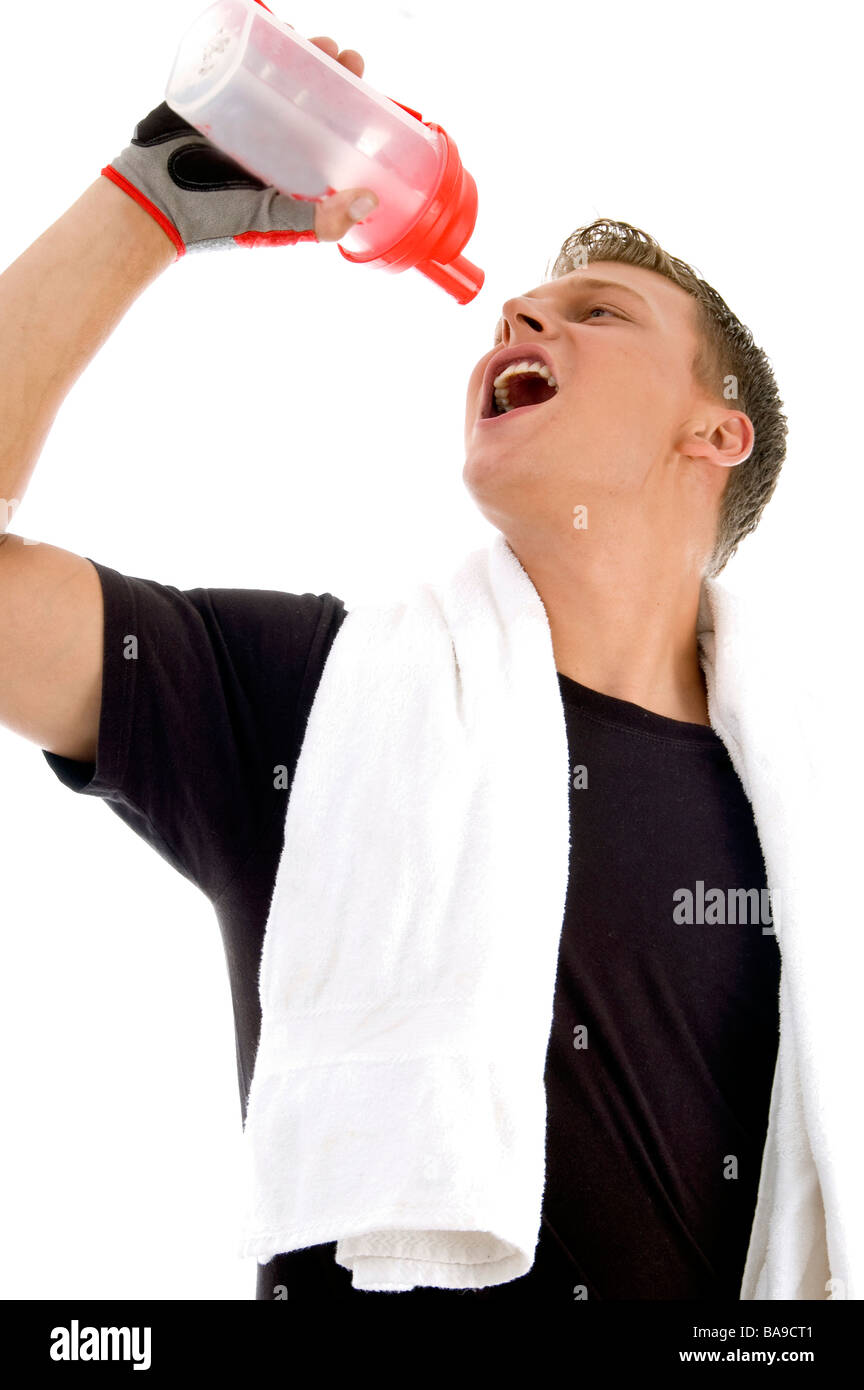 man taking drink while exercise Stock Photo - Alamy