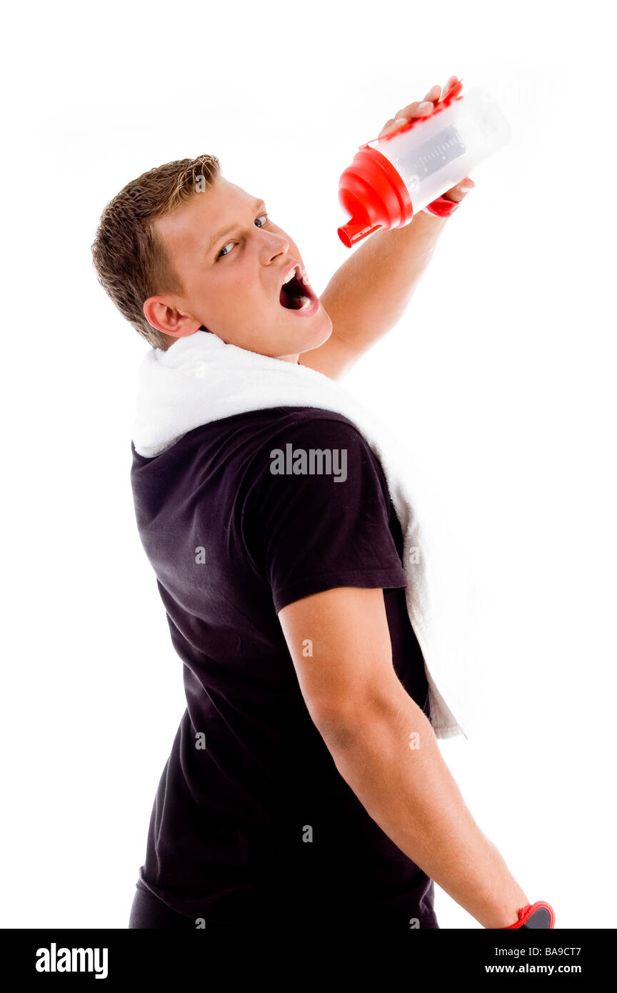 back pose of muscular man drinking from water bottle Stock Photo - Alamy