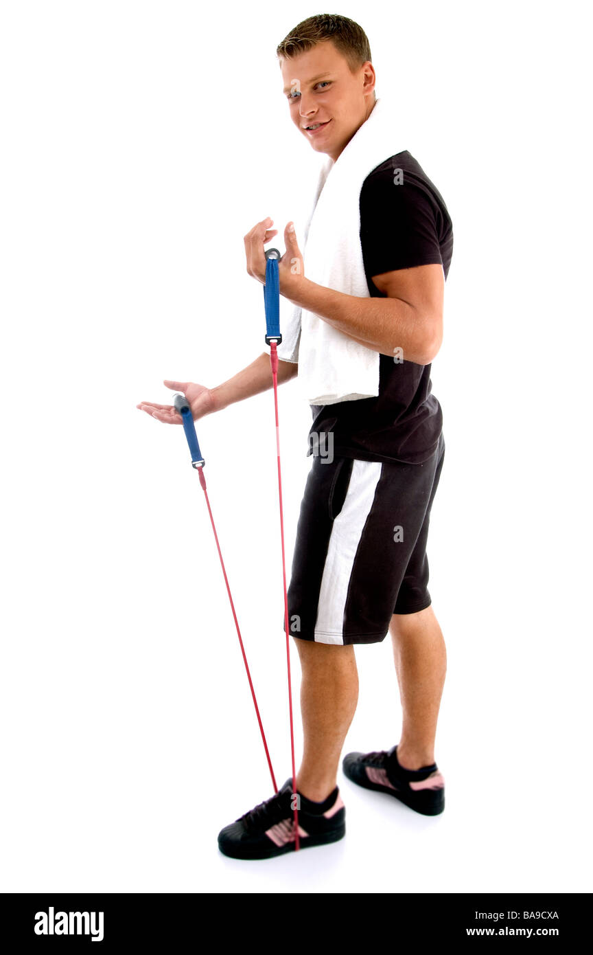 exercising man holding rope Stock Photo - Alamy