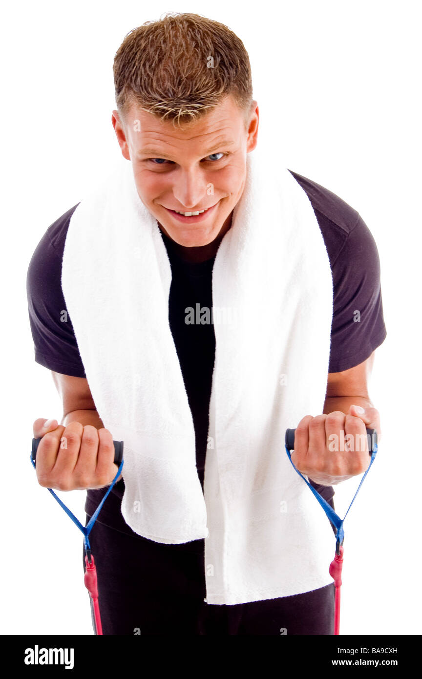 attractive man doing exercise with help of stretch rope Stock Photo - Alamy