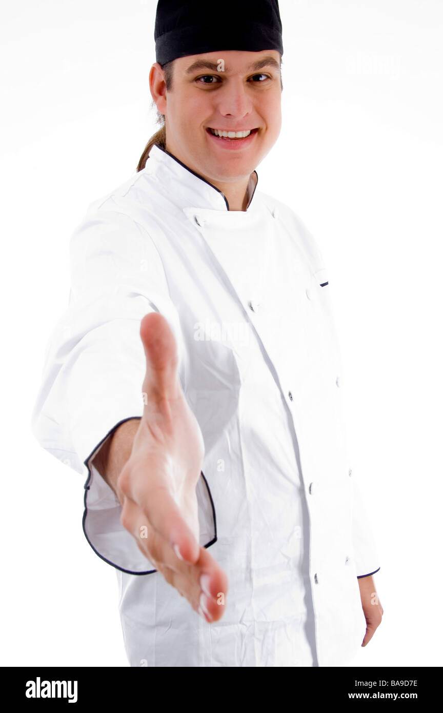 portrait of young chef offering handshake Stock Photo - Alamy