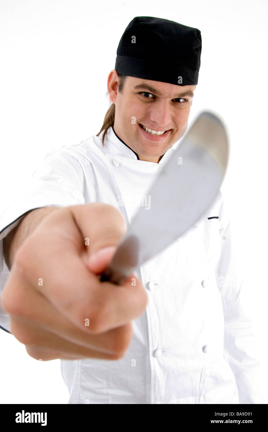 male chef showing kitchen tool with facial expressions Stock Photo - Alamy