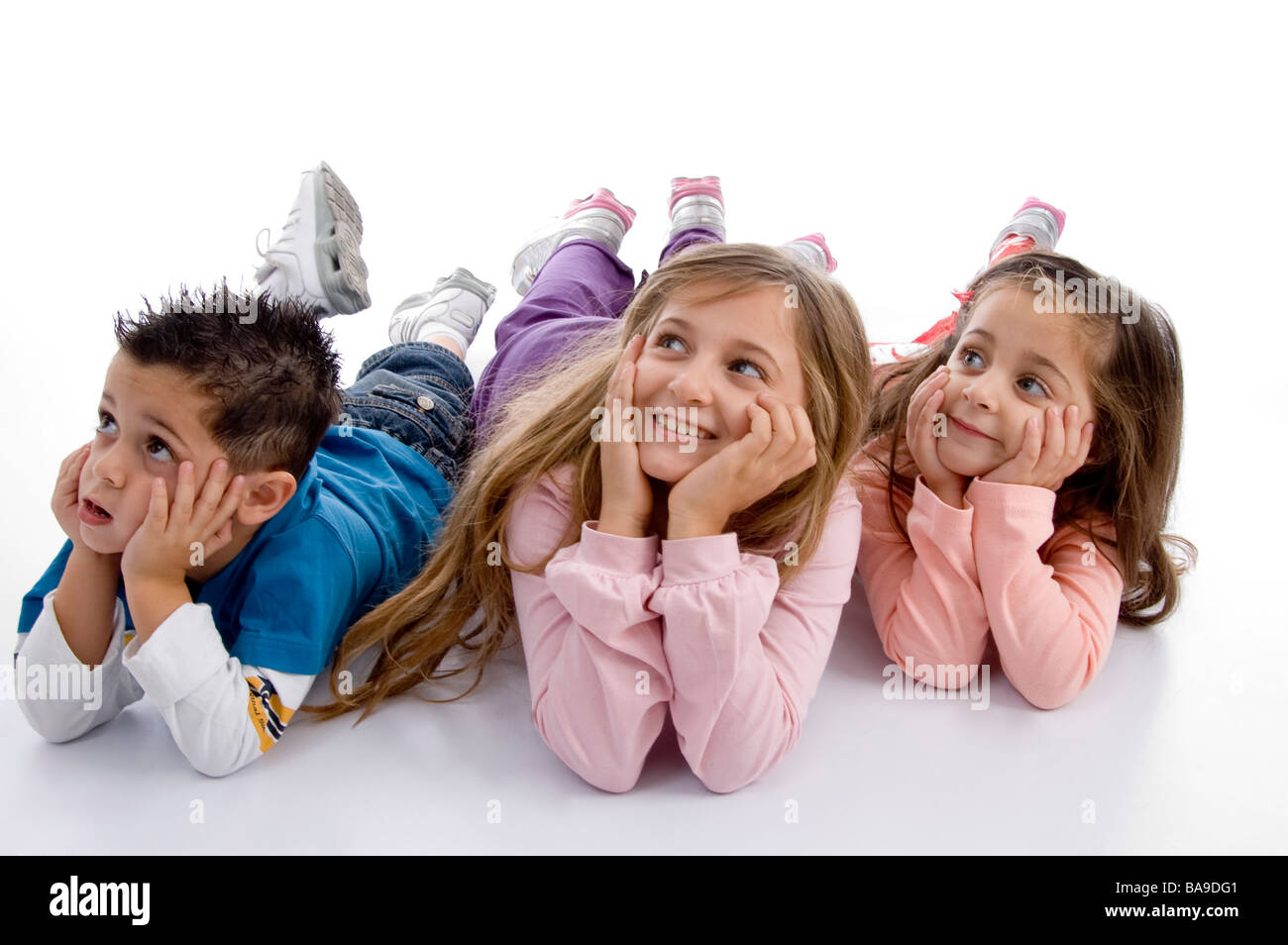 laying kids looking upward Stock Photo - Alamy