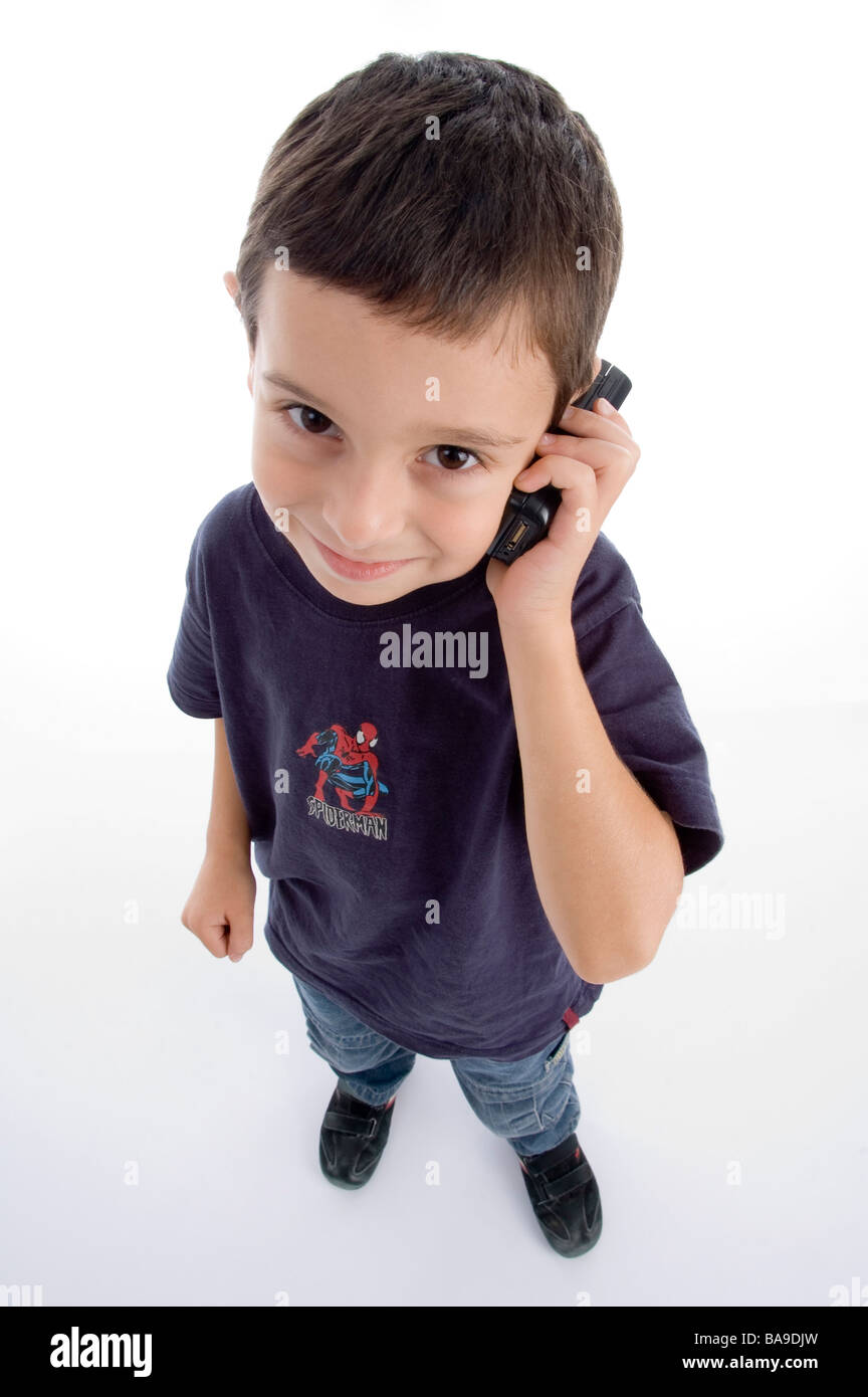 adorable boy busy on phone call Stock Photo - Alamy