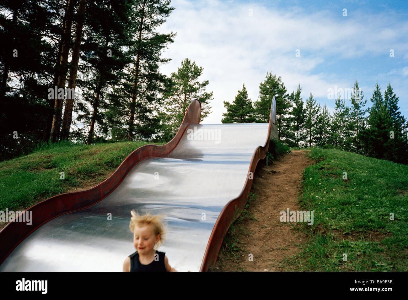 Girl going on a slide hi-res stock photography and images - Alamy