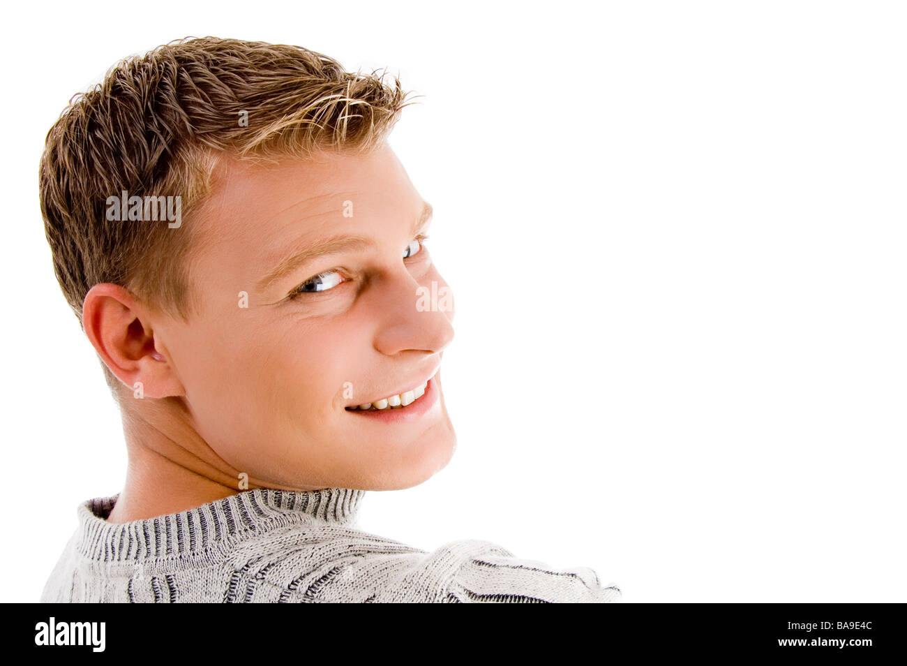 smiling man looking backward Stock Photo - Alamy
