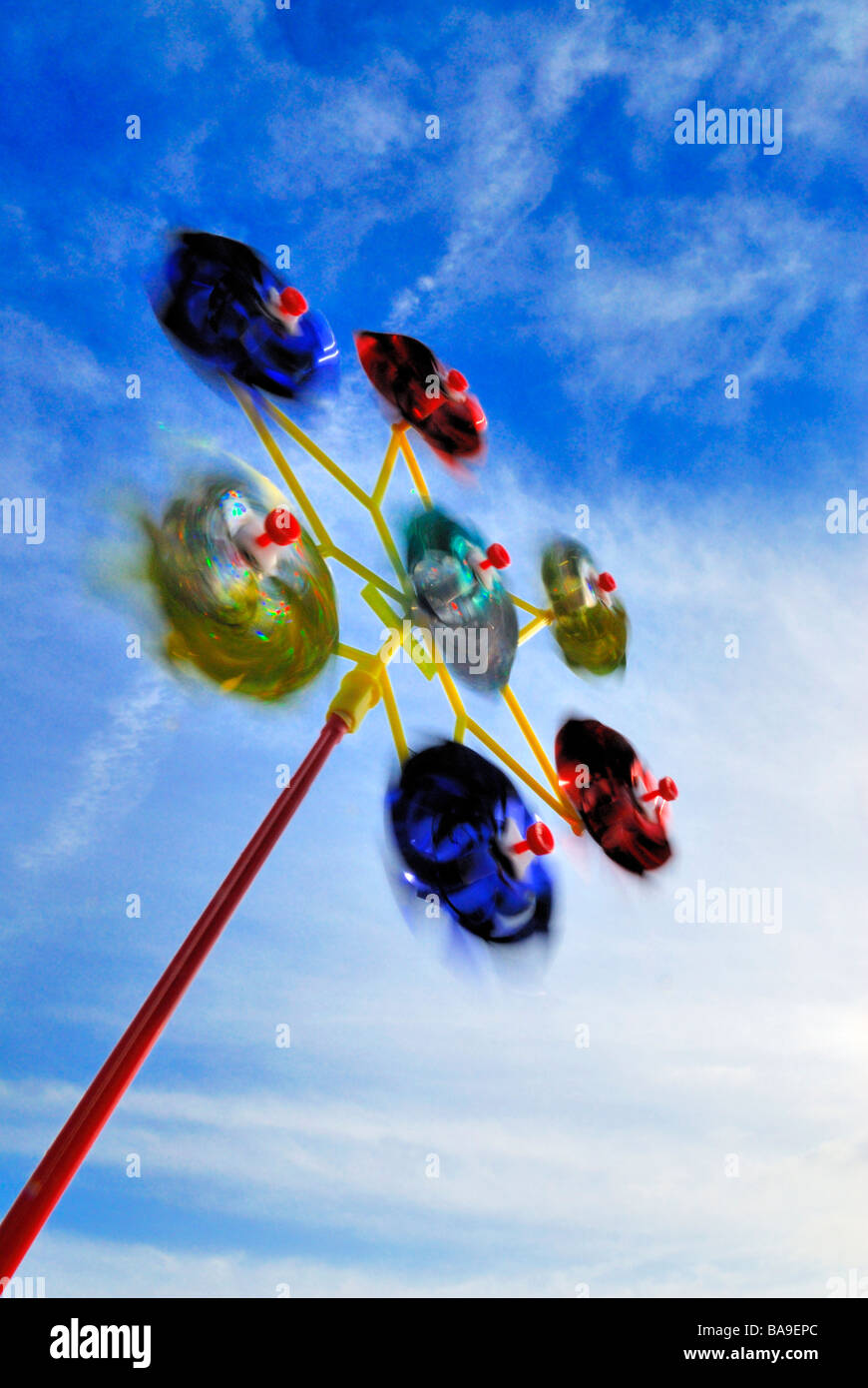 Toy Windmill Blowing in the Wind Stock Photo - Alamy