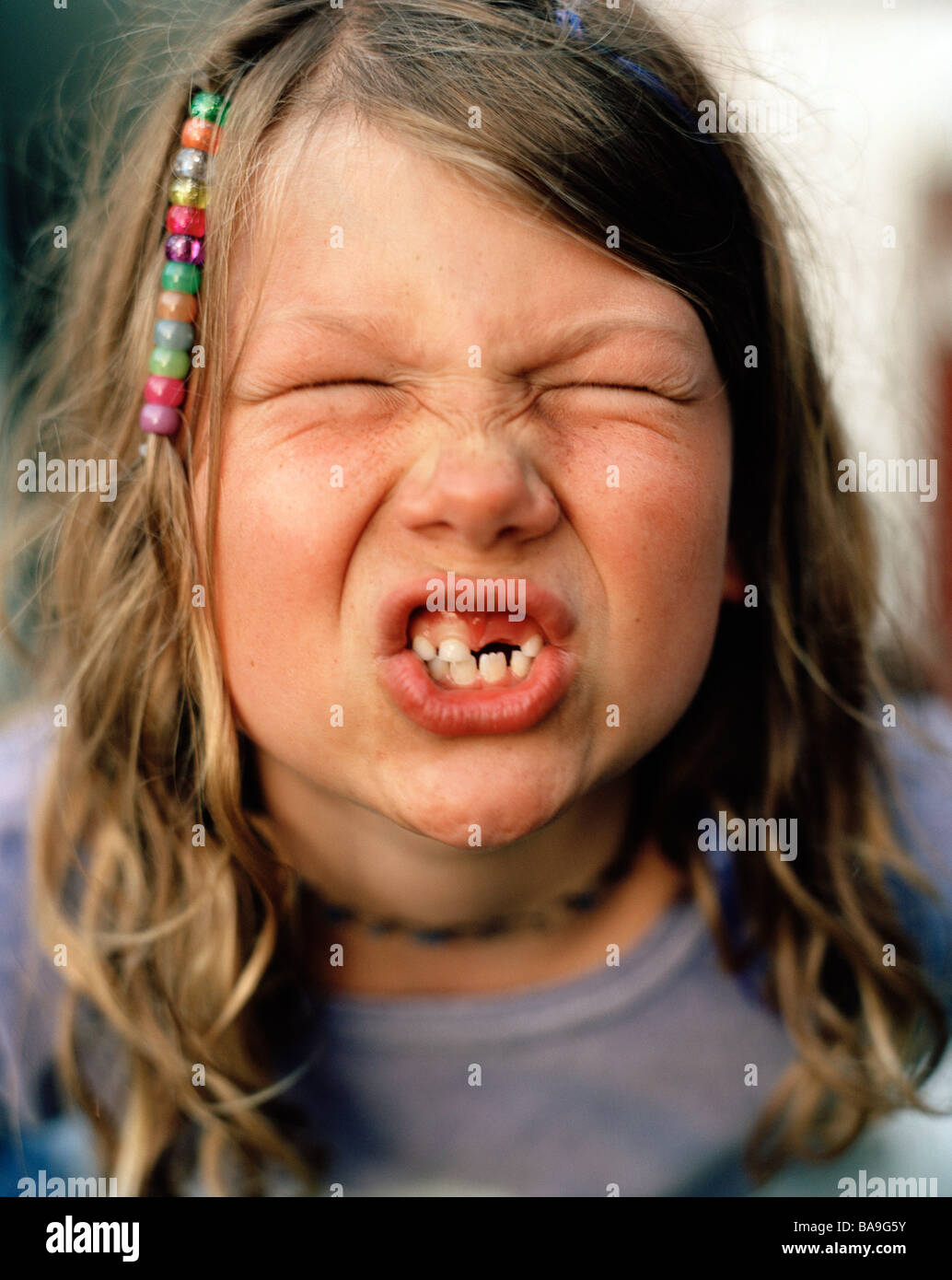 A girl making a face, Sweden Stock Photo - Alamy