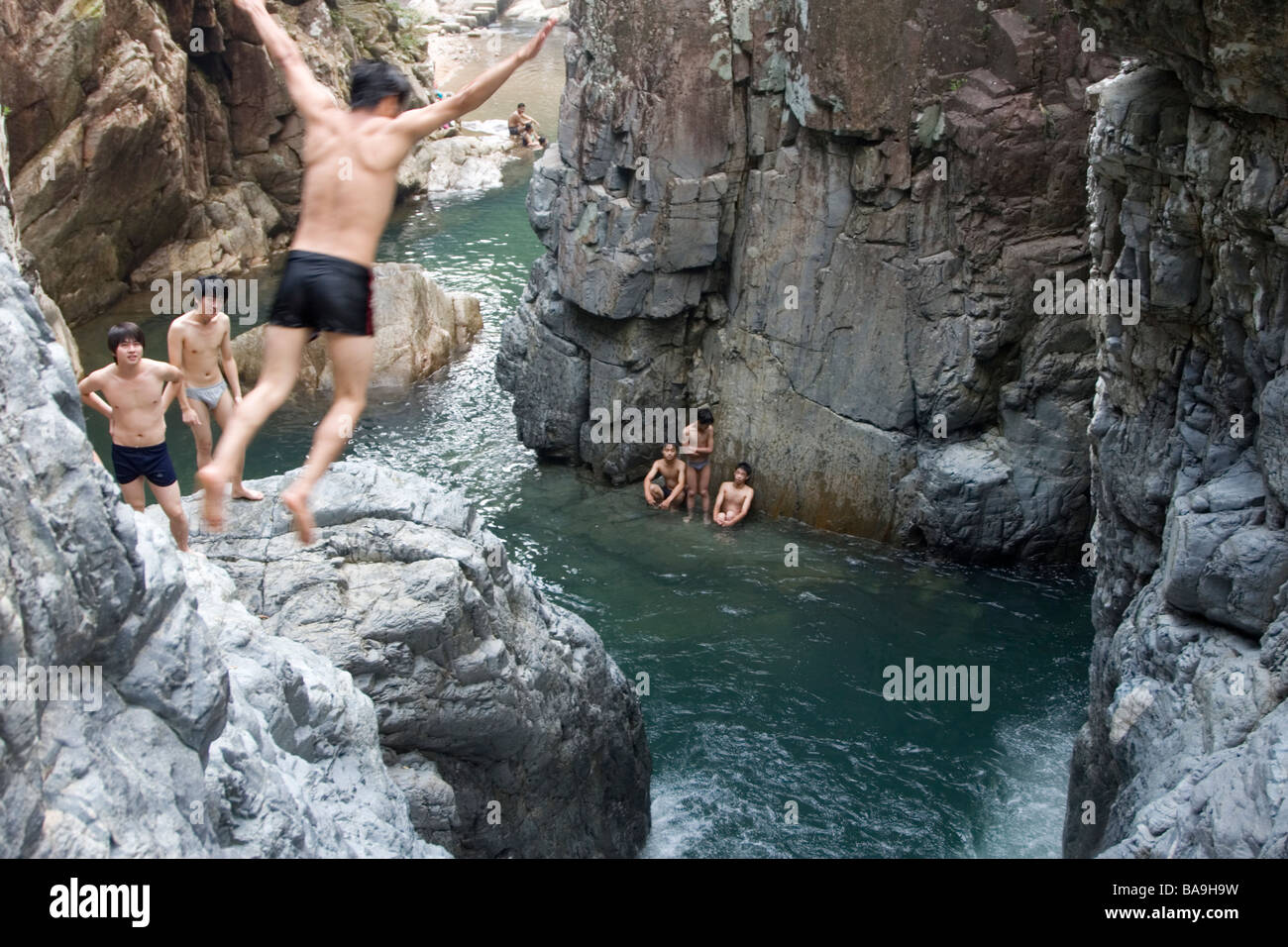 Boy diving into river hi-res stock photography and images - Alamy