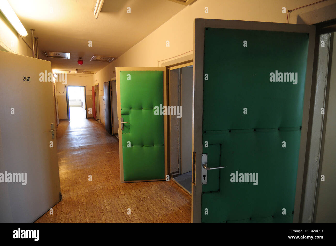 Corridor lined by interrogation rooms, former East German prison of ...