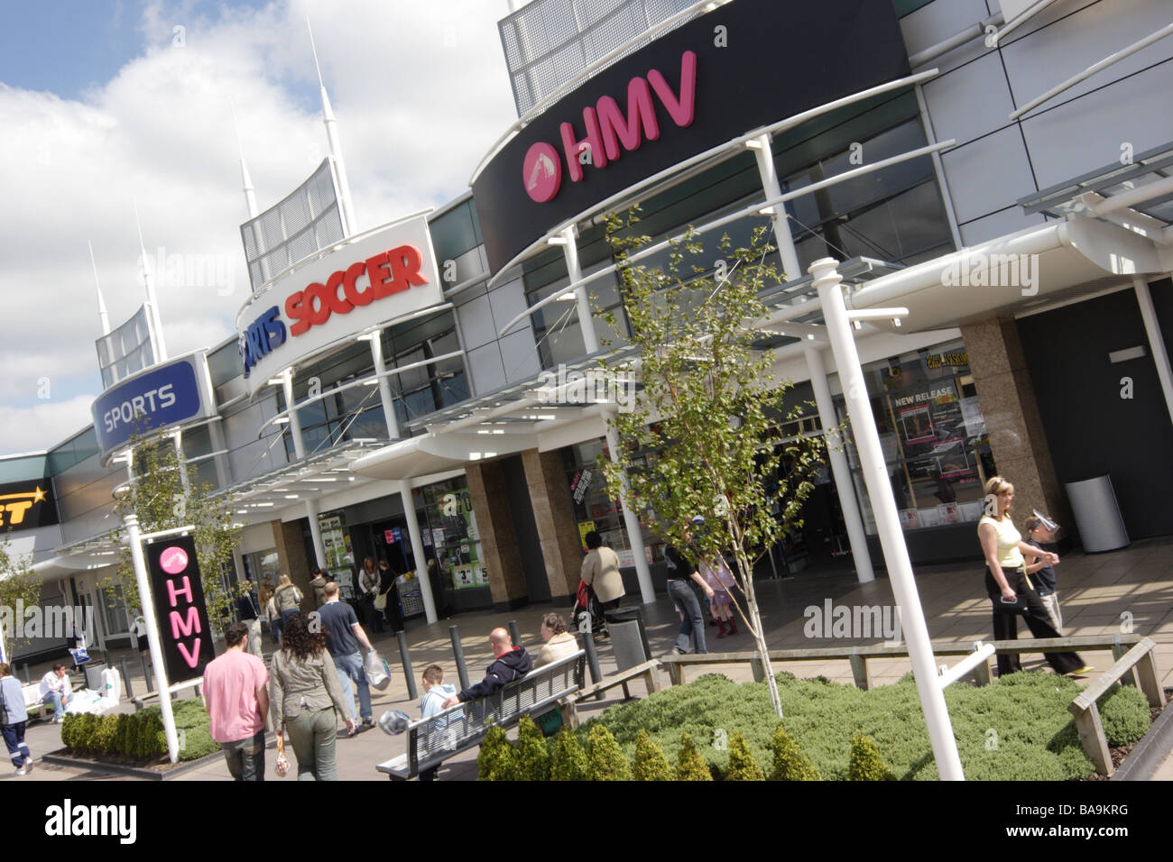 Couple walking towards HMV store, Parkgate Shopping, Rotherham Stock ...