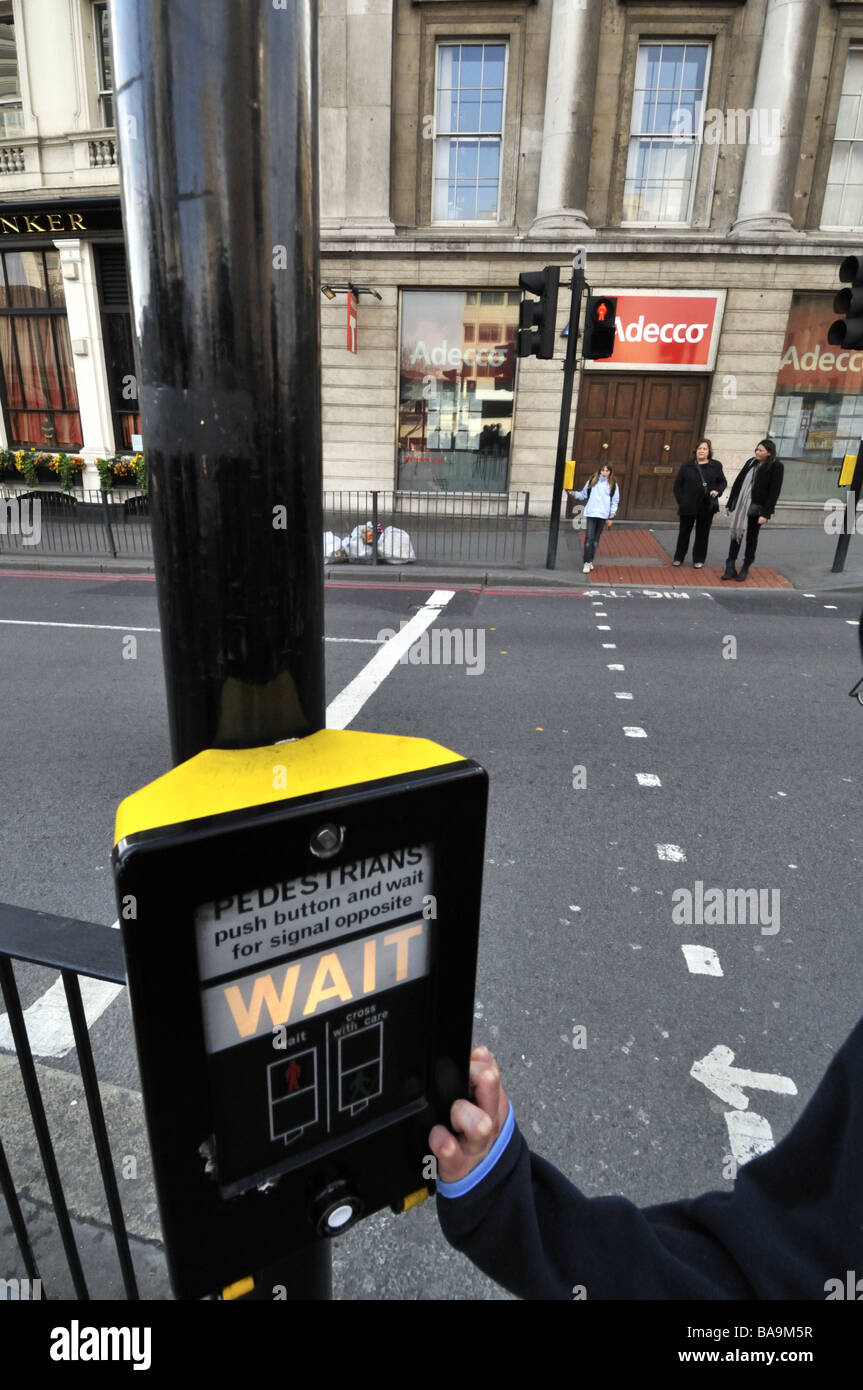 Waiting for the green light at pedestrian crossing London Stock Photo ...
