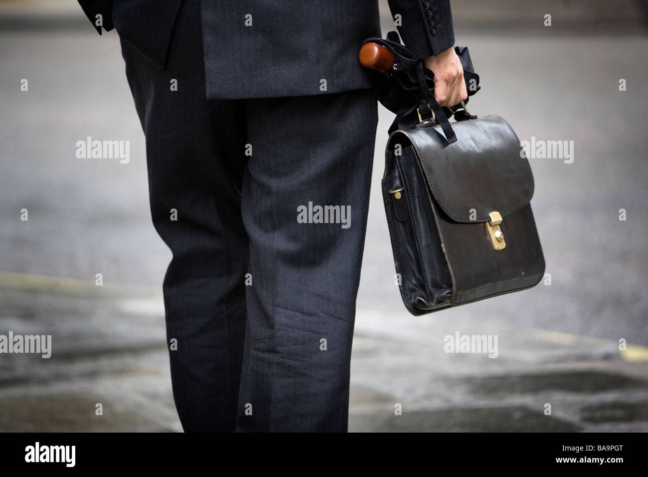 Man carrying a man in suits hi-res stock photography and images - Alamy
