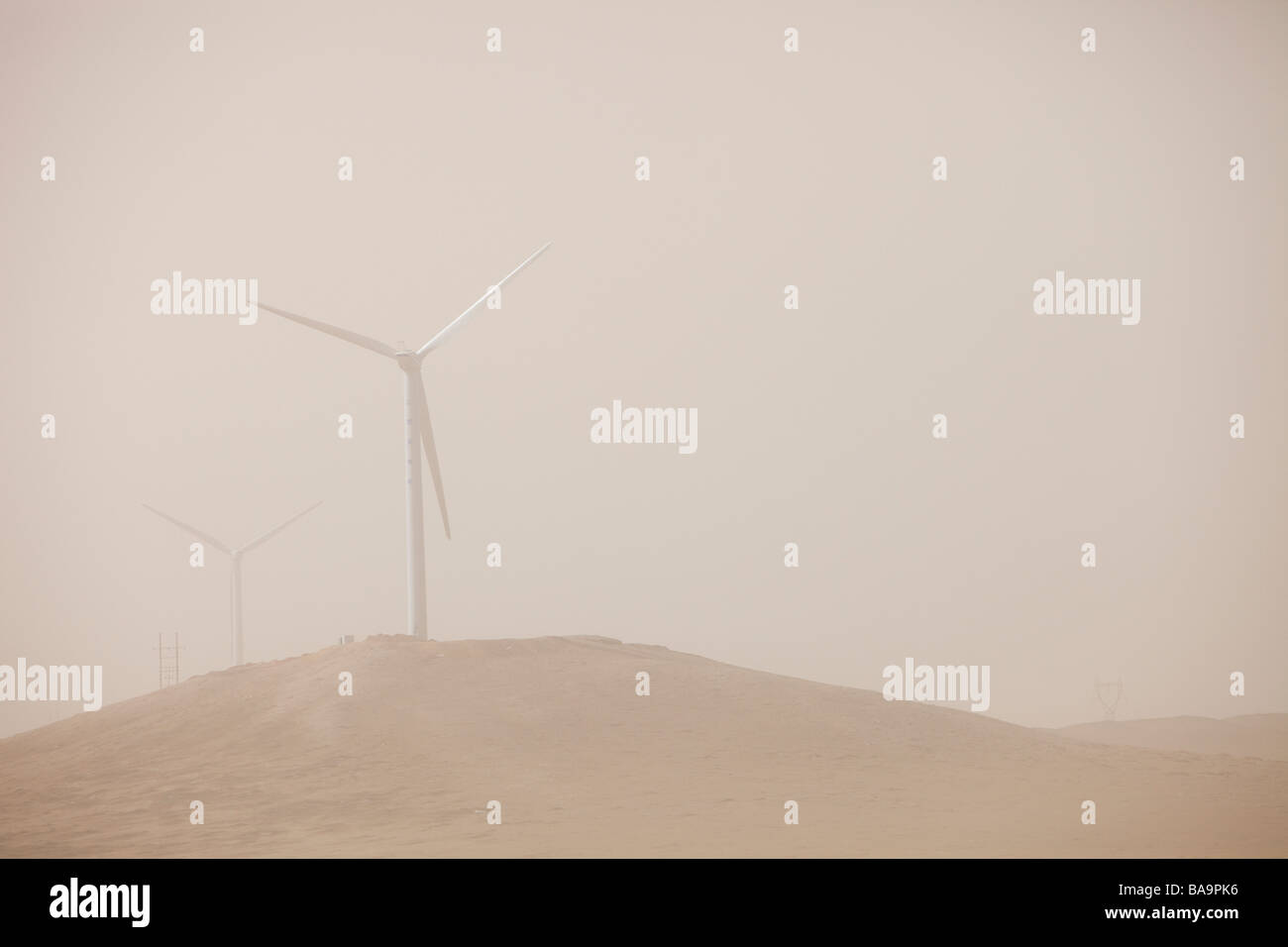 A wind farm in inner Mongolia, China in a dust storm. Area badly hit by ...