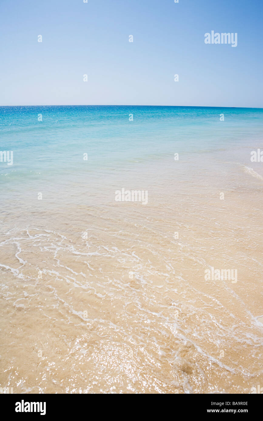 Blue ocean by a beach Stock Photo - Alamy