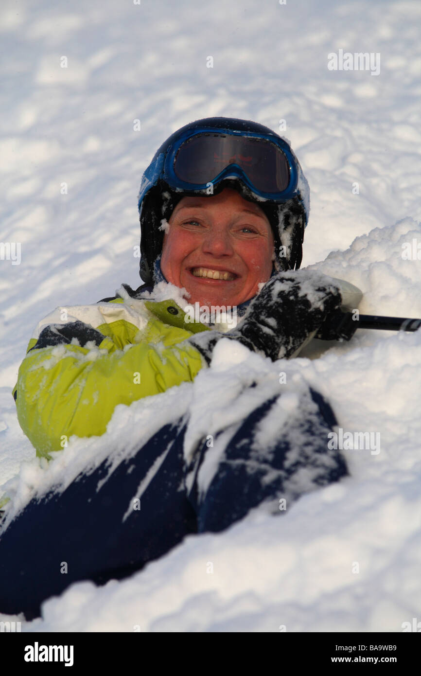 Woman laying down in snow hi-res stock photography and images - Alamy
