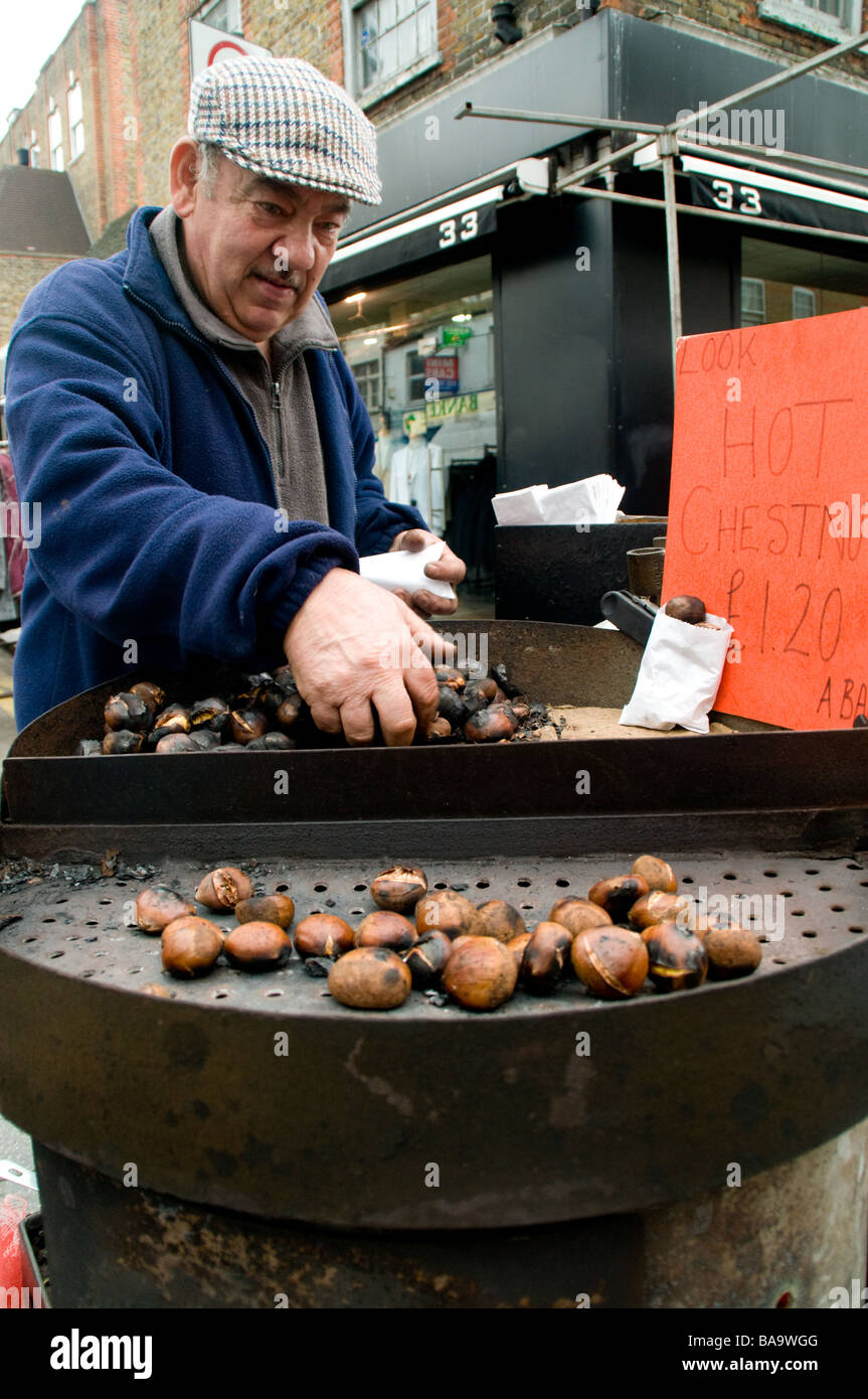 Chestnut seller at Petticoat Lane Market Stock Photo - Alamy