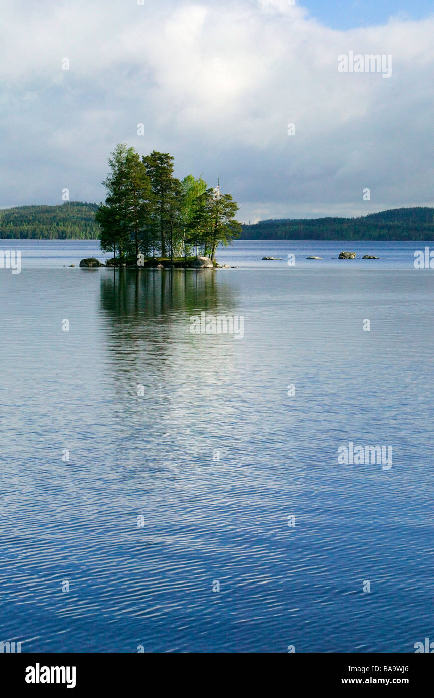 A small island in a lake Sweden Stock Photo - Alamy
