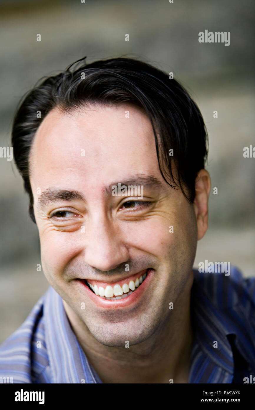 Portrait of a smiling man Stock Photo - Alamy