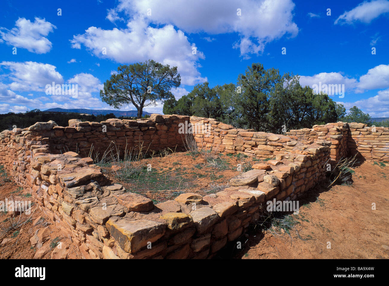 Blue sky and clouds over surface pueblo ruins at Mule Canyon Anasazi ...