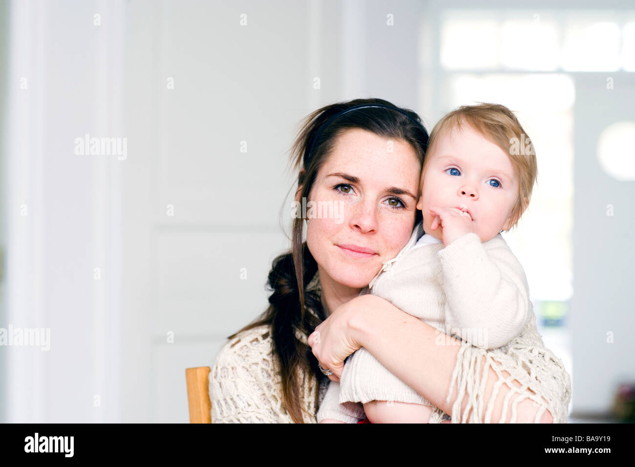 Woman embracing her child, Sweden Stock Photo - Alamy