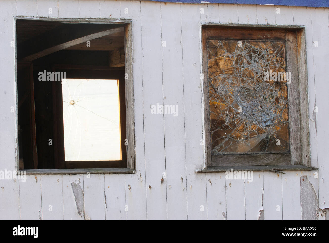 Crushed window on a building Stock Photo - Alamy