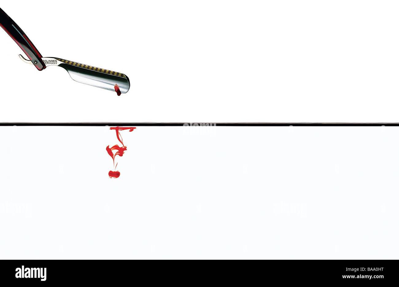 A razor with blood Stock Photo - Alamy