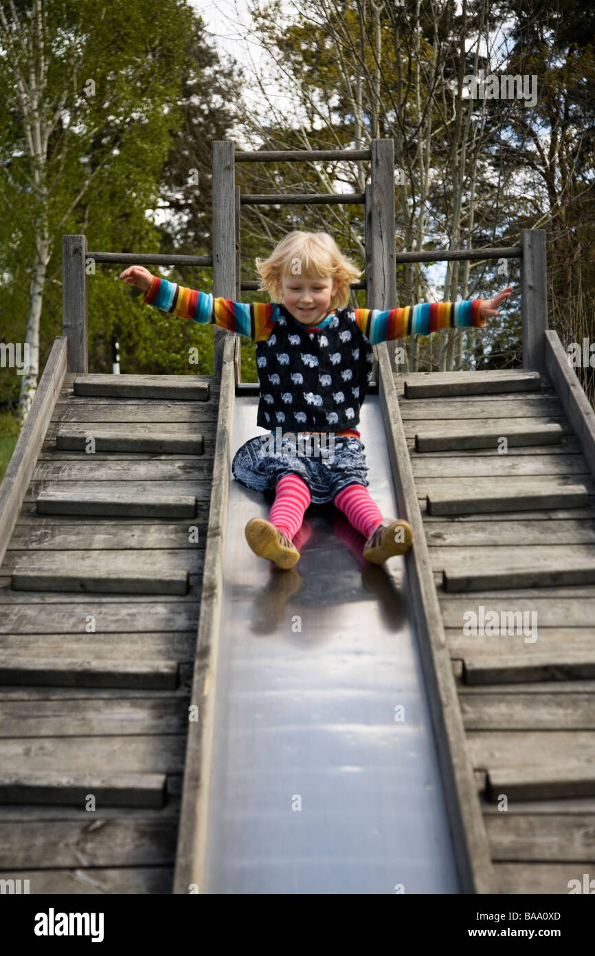 Girl going on a slide hi-res stock photography and images - Alamy