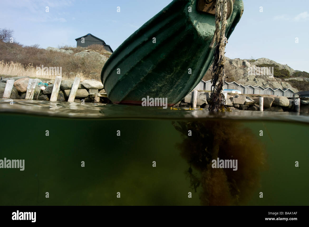 Swedish coast view, small rowing boat, above and below water, Halland ...
