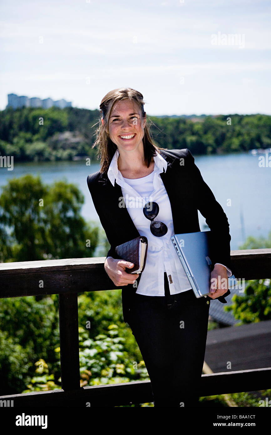 Carrying lap top hi-res stock photography and images - Alamy