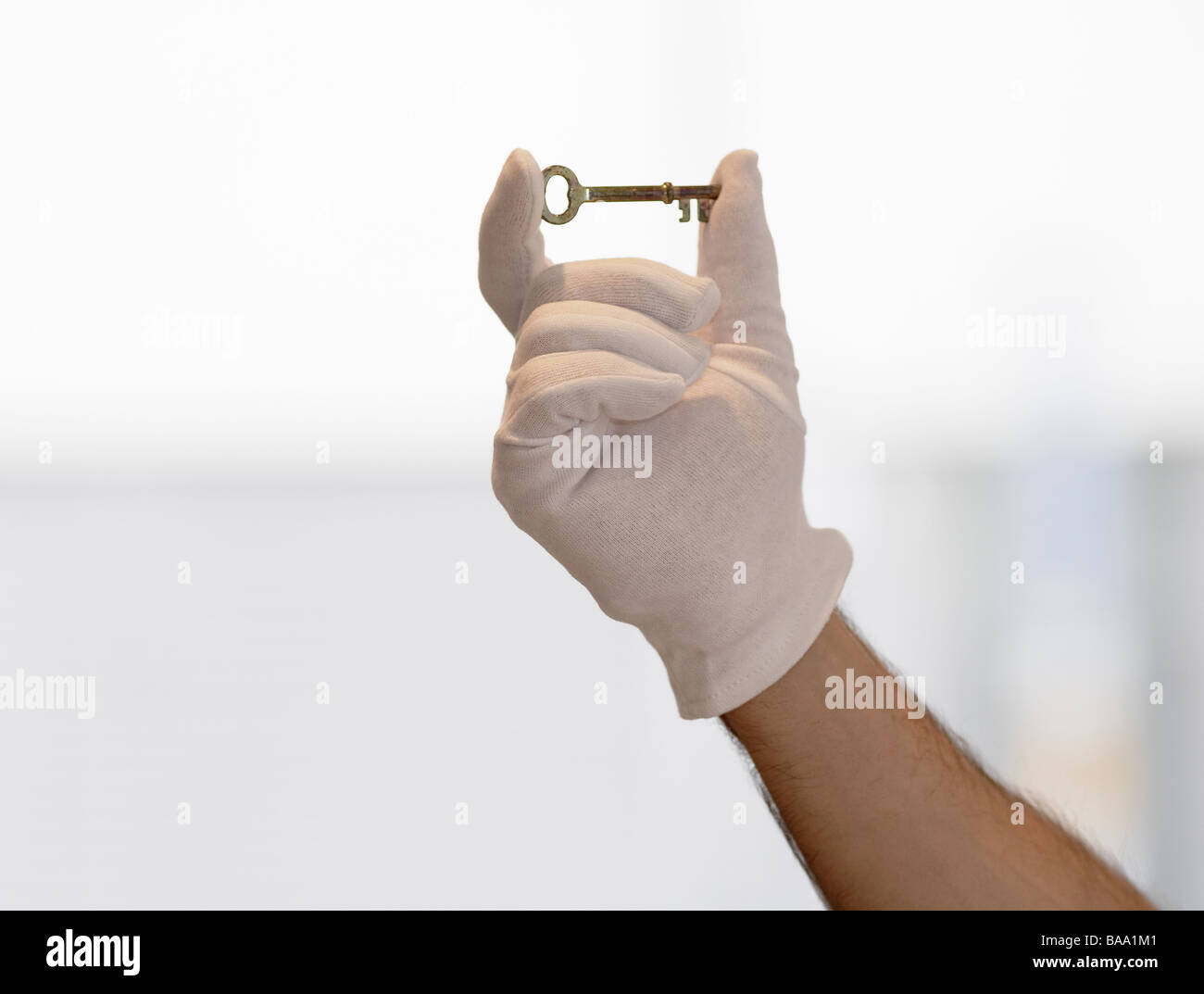 A hand holding a key, Sweden Stock Photo - Alamy