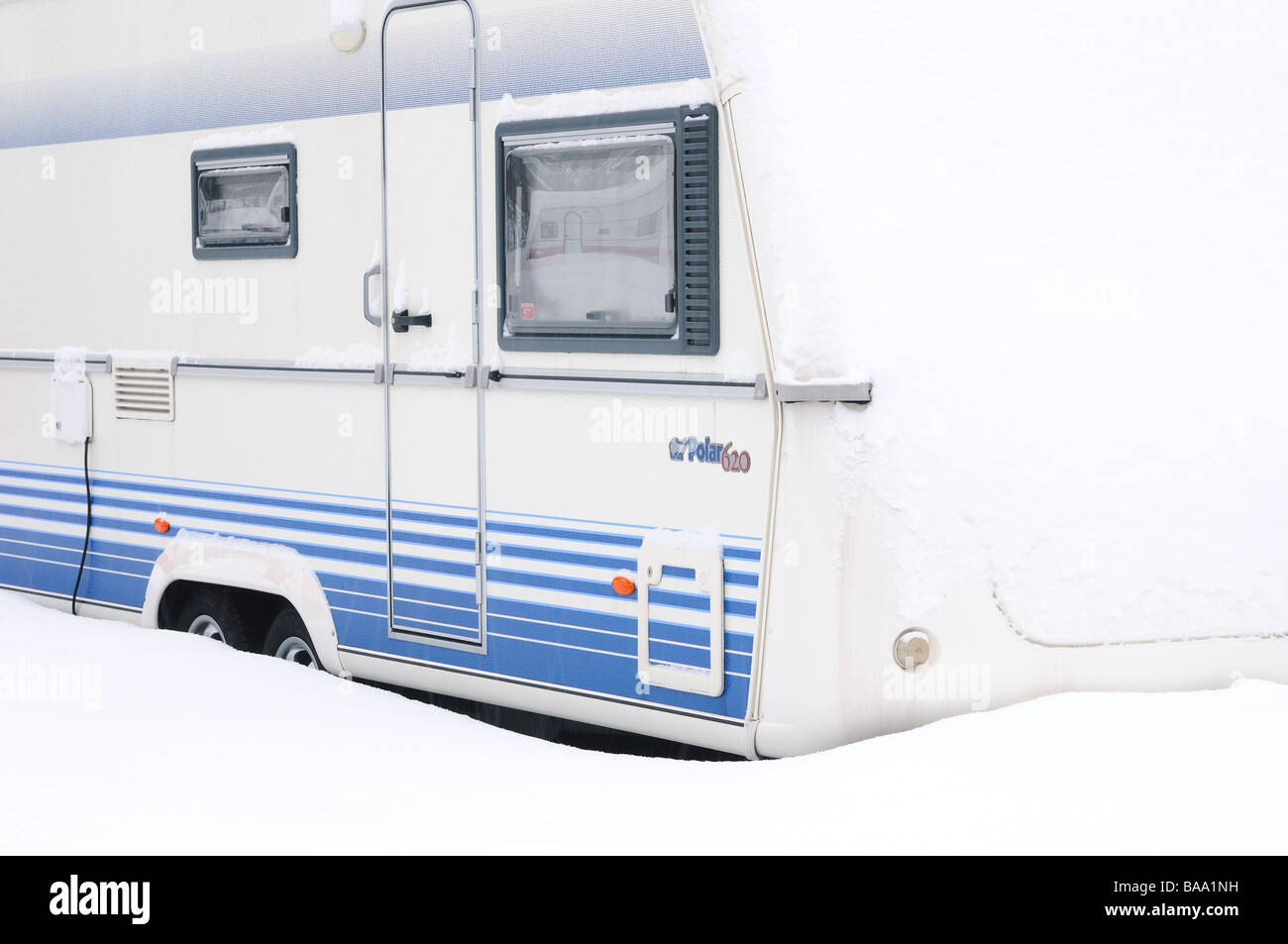 A caravan covered with snow Sweden Stock Photo - Alamy