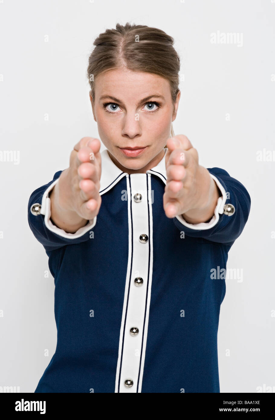 A Scandinavian woman pointing out the direction Stock Photo - Alamy