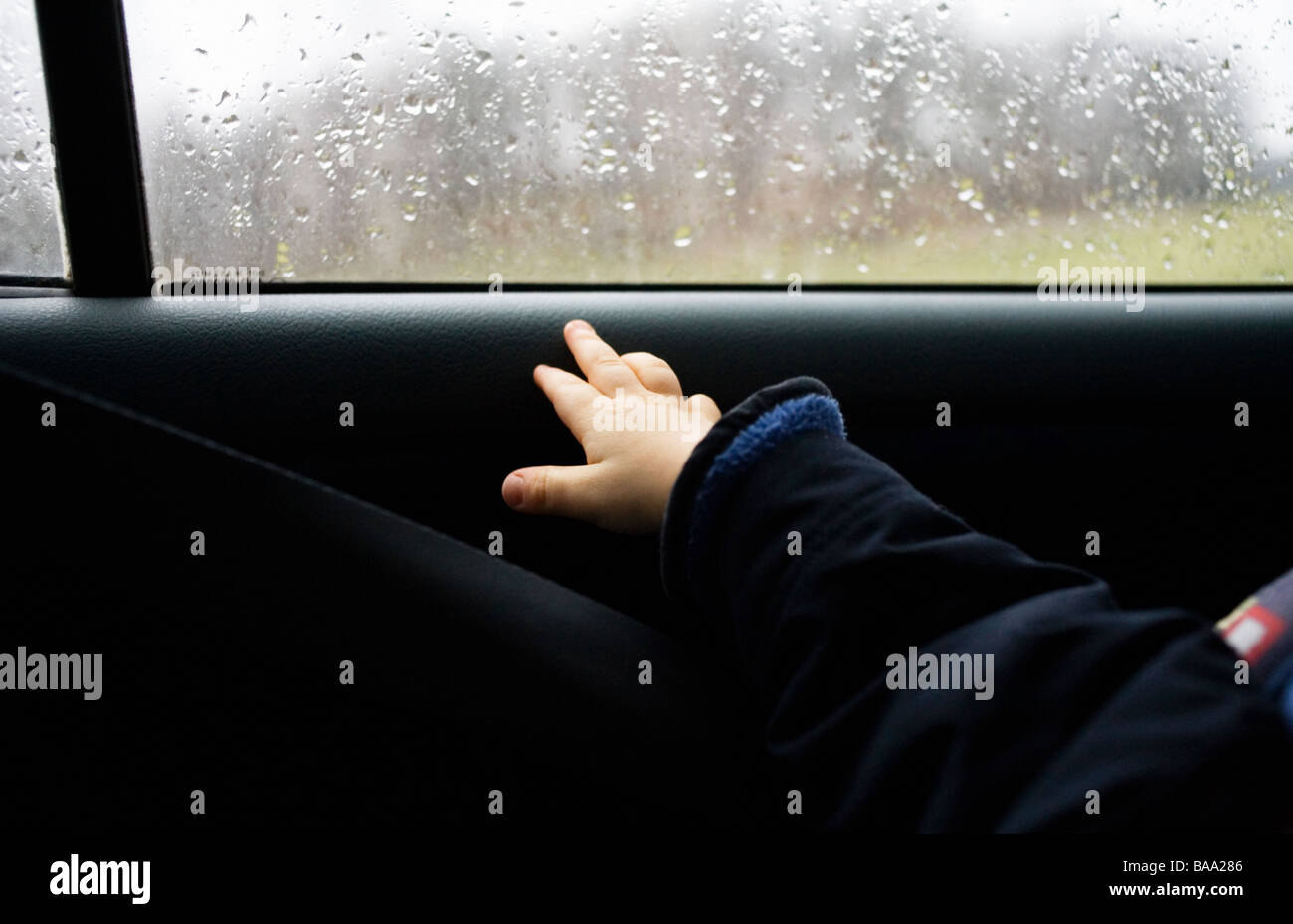 Child reaching for the car window, Sweden Stock Photo - Alamy
