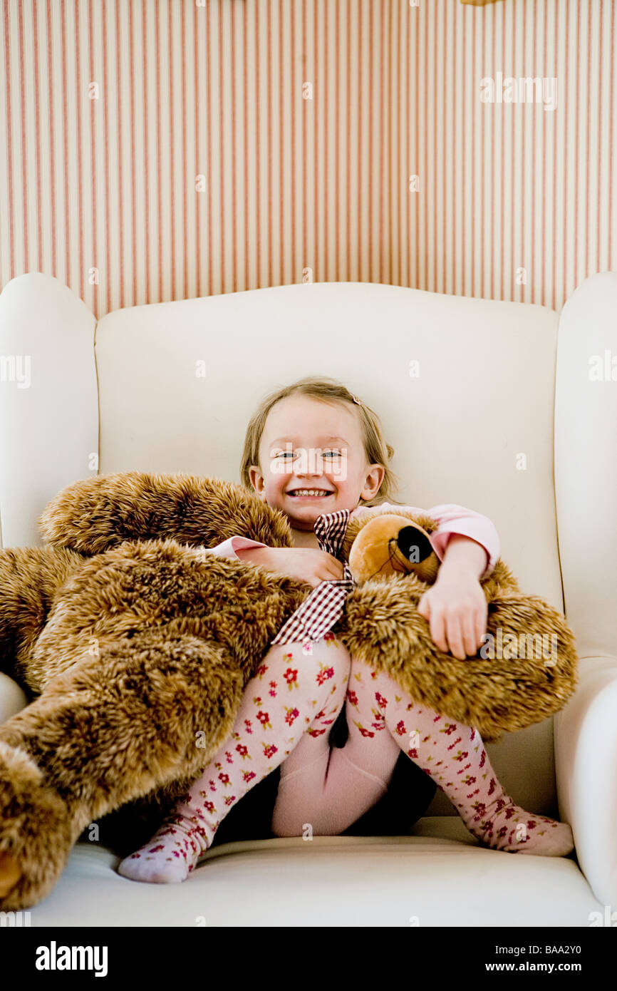 Child seated in an armchair hi-res stock photography and images - Alamy