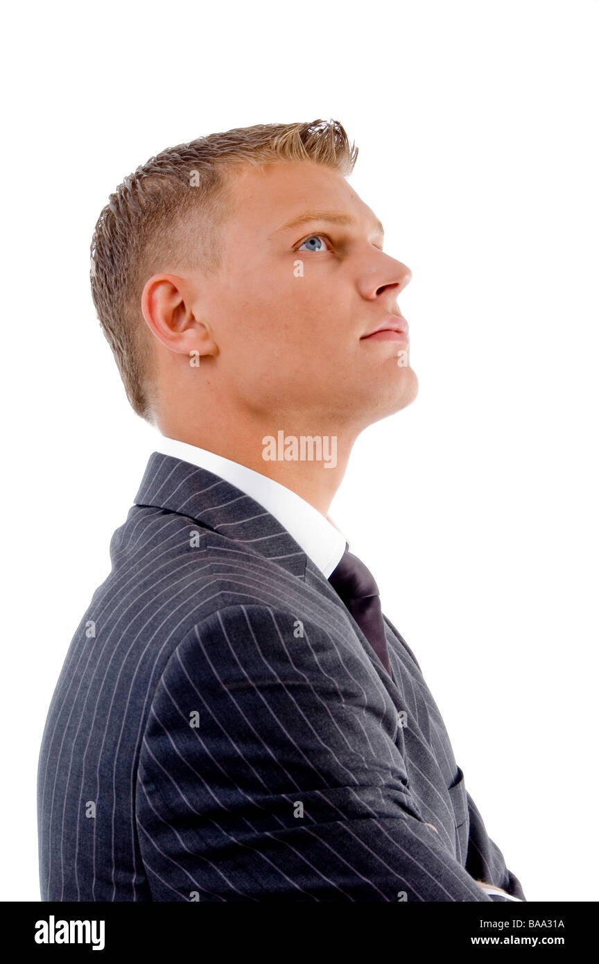 side view of businessman looking upward Stock Photo - Alamy