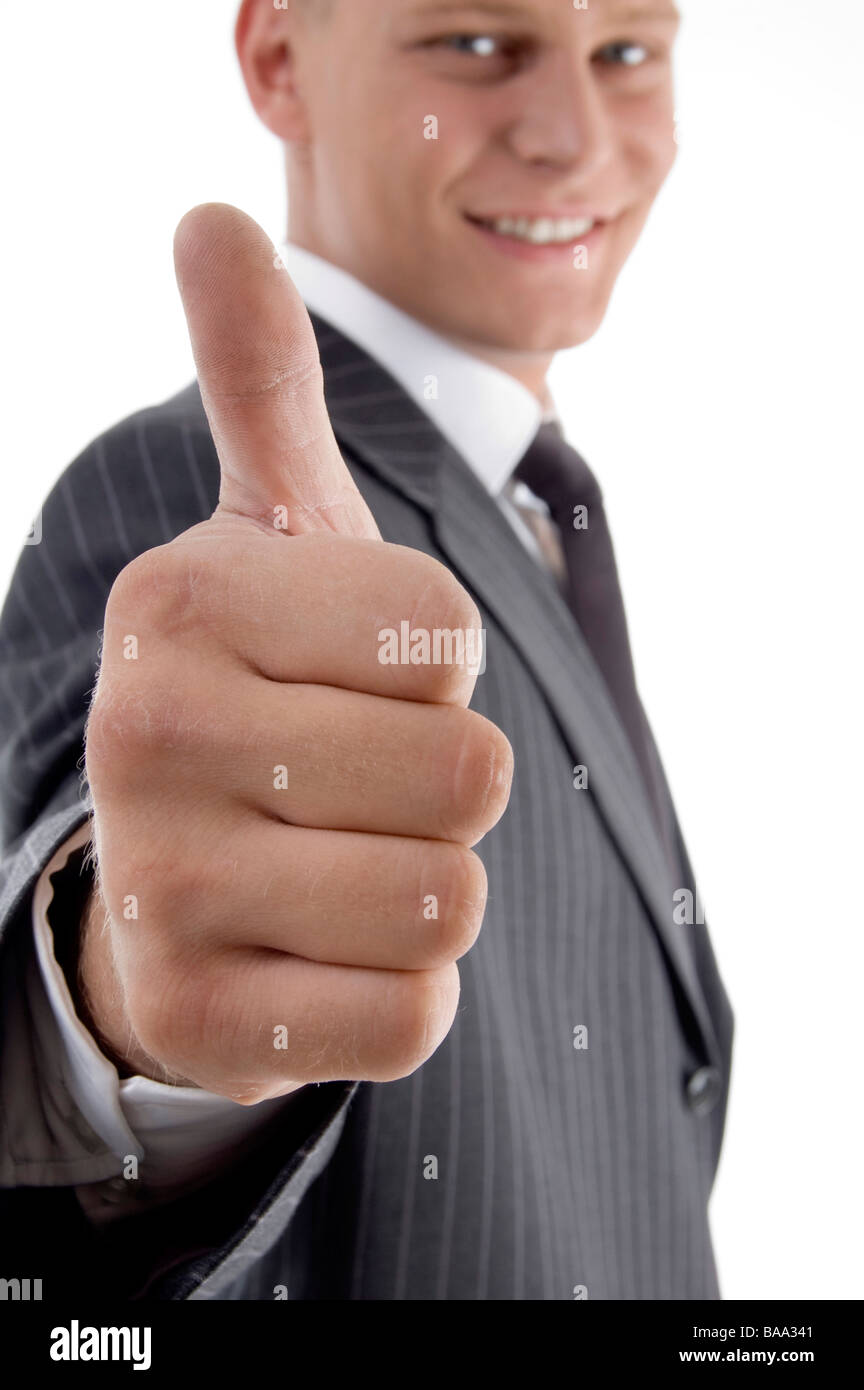 smiling handsome ceo showing thumb up Stock Photo - Alamy