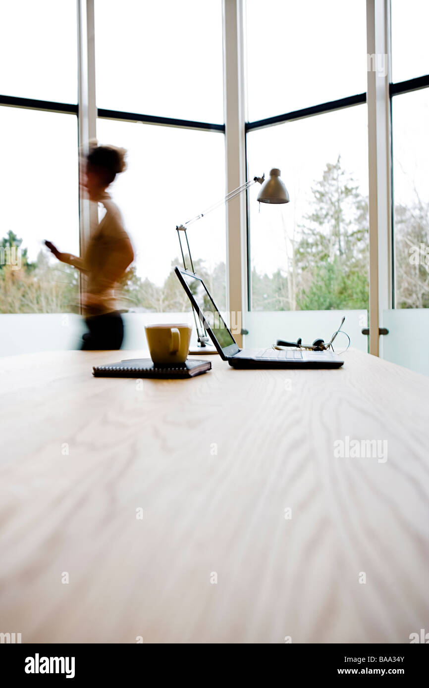 A woman looking out through a window, Sweden Stock Photo - Alamy