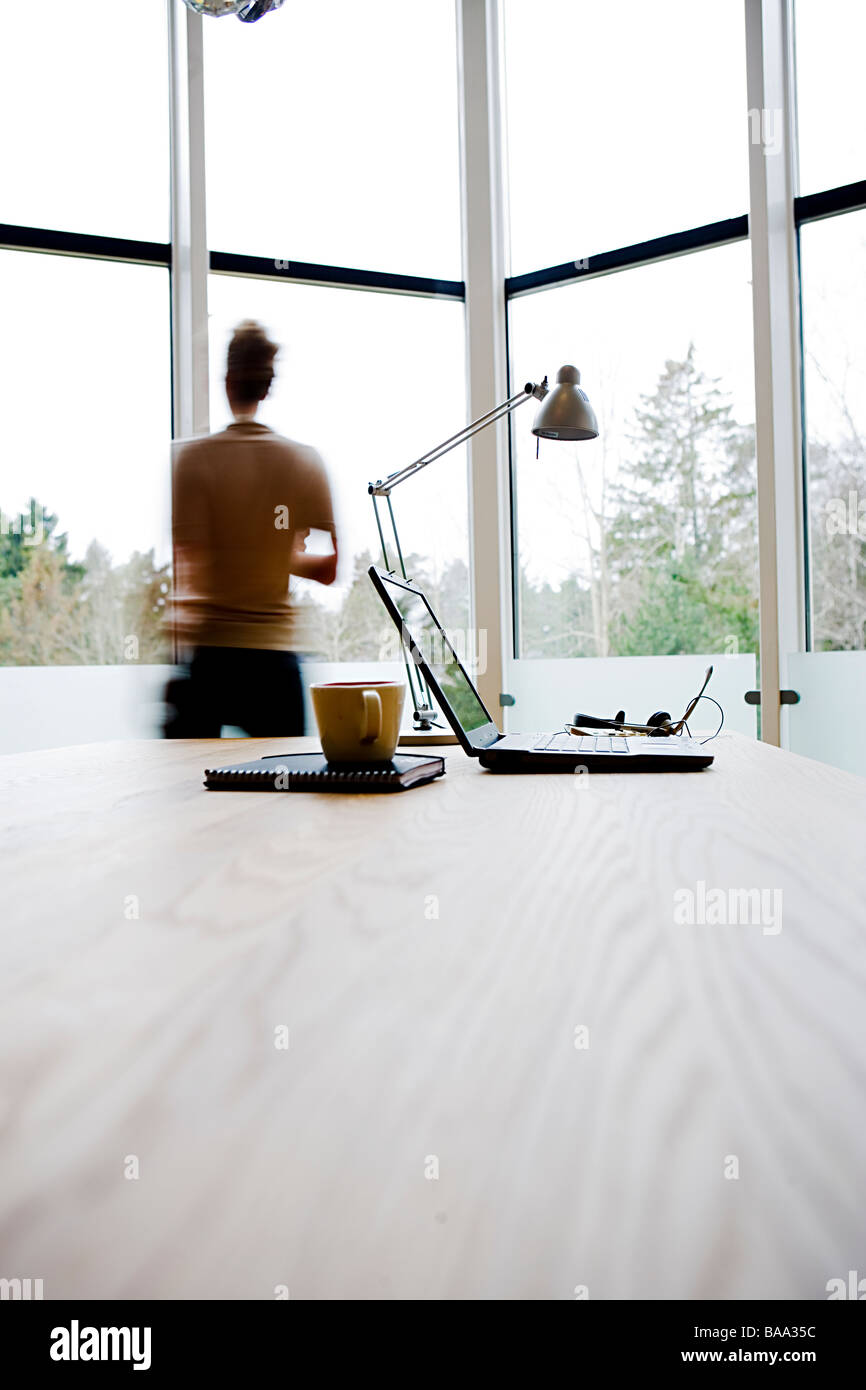A woman looking out through a window, Sweden Stock Photo - Alamy