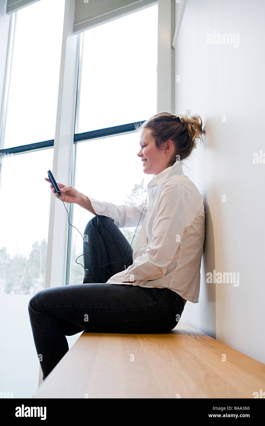 A woman using a mobile phone, Sweden Stock Photo - Alamy
