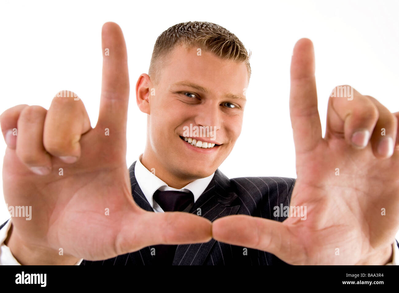 young man framing his face with hand gesture Stock Photo - Alamy