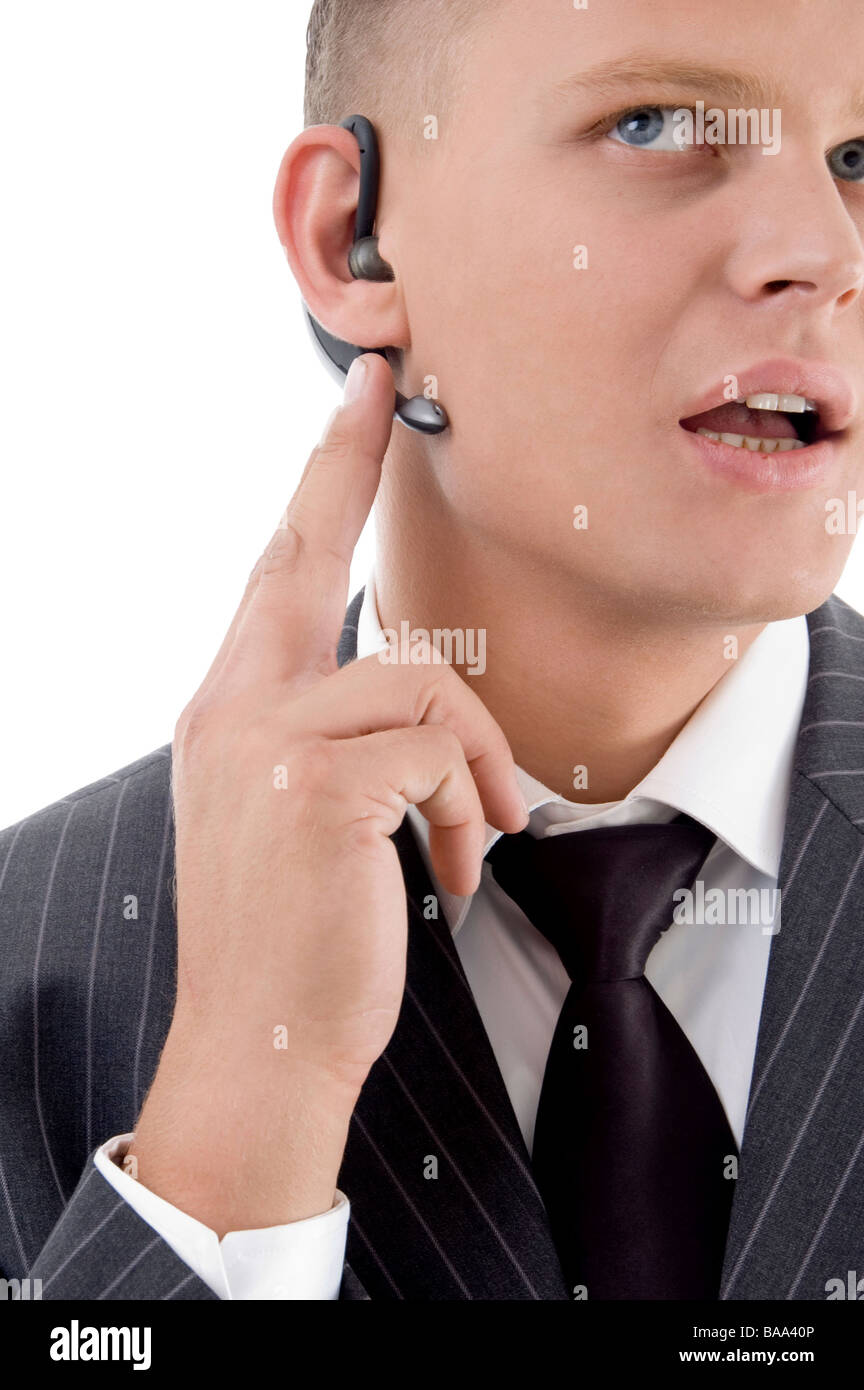businessman operating bluetooth Stock Photo - Alamy