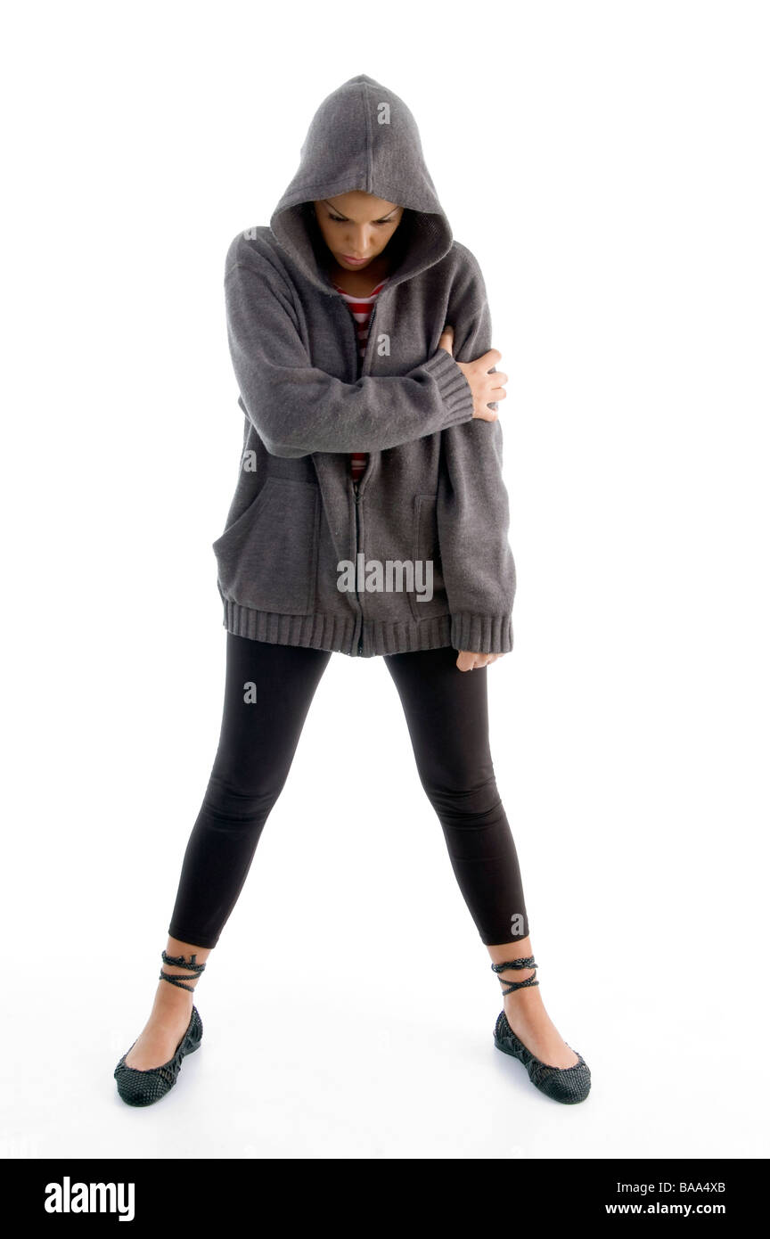 standing woman looking downward Stock Photo - Alamy