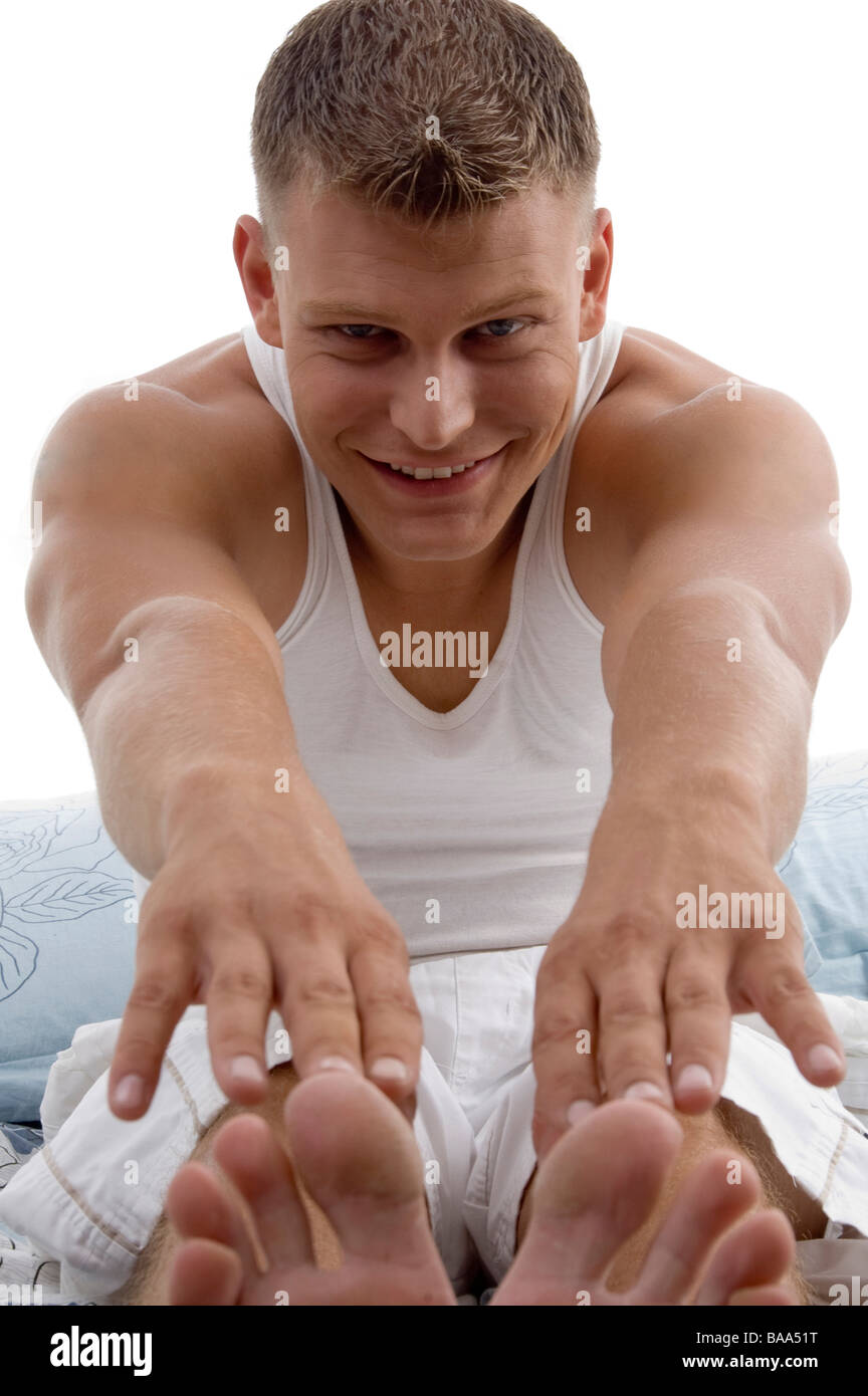 man looking at camera and exercising Stock Photo - Alamy