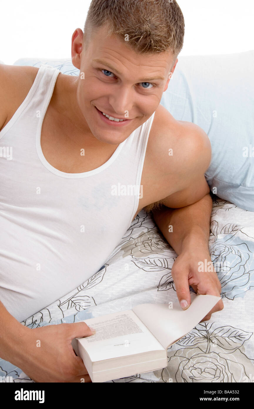 handsome male reading book Stock Photo - Alamy