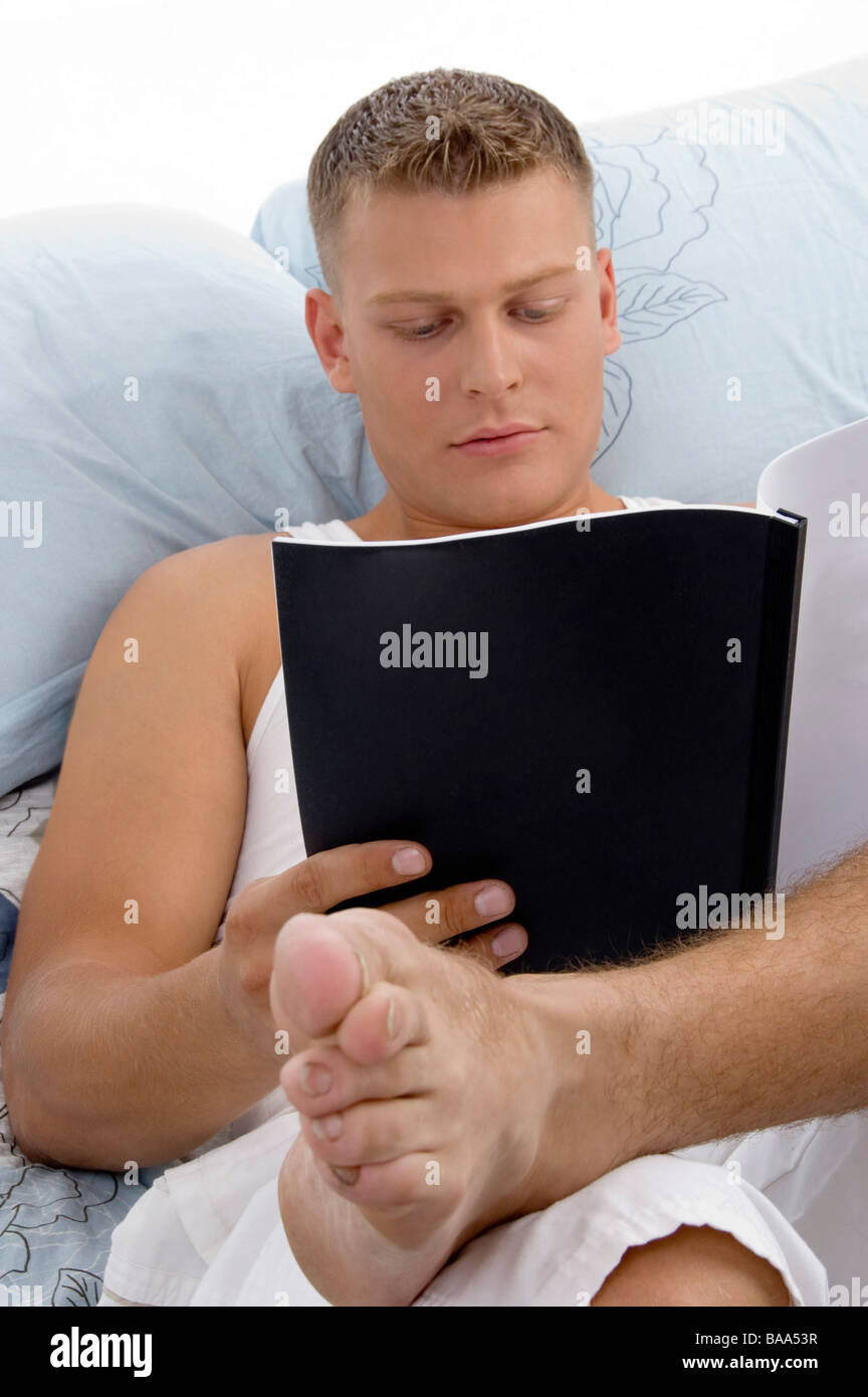 Guy bed sleep sleeping reading hi-res stock photography and images - Alamy