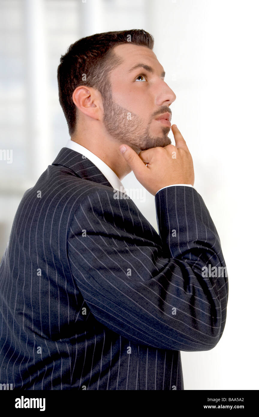 thinking young executive Stock Photo - Alamy