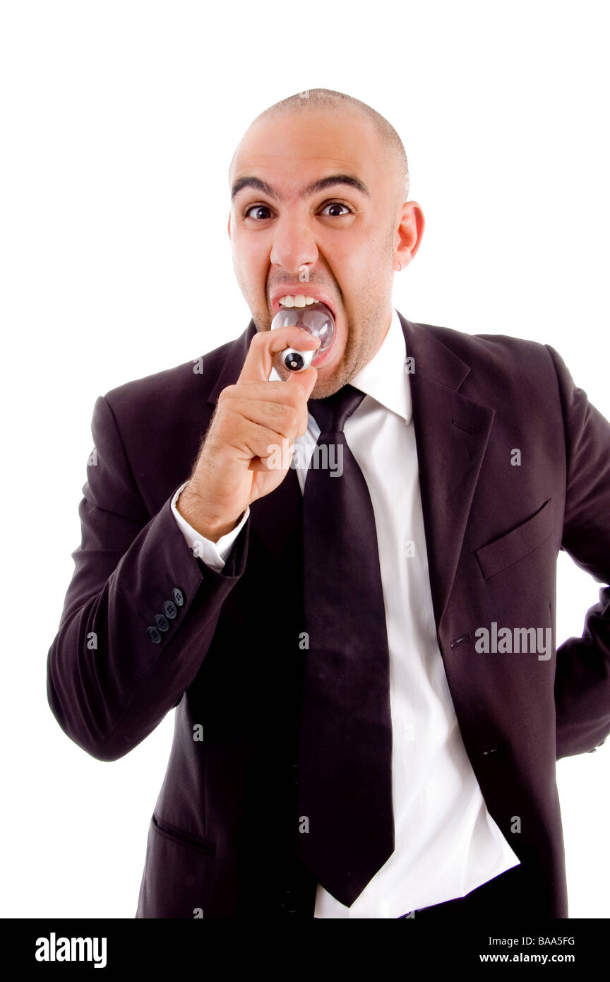 male eating light bulb Stock Photo - Alamy