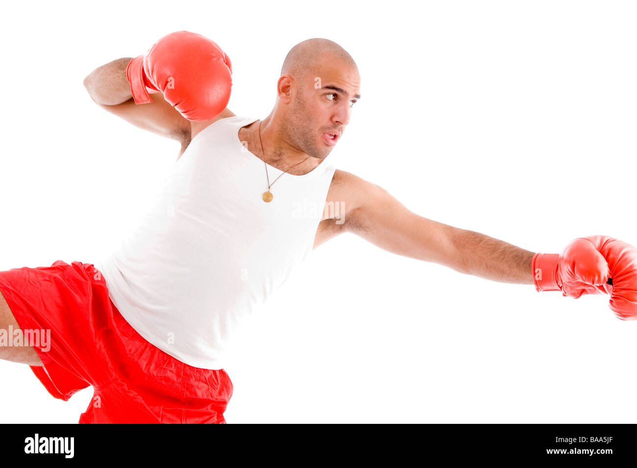 male boxer in pose to punch hard Stock Photo - Alamy