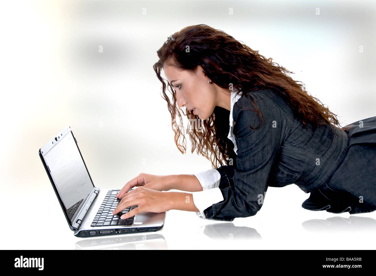 beautiful female working on laptop Stock Photo - Alamy